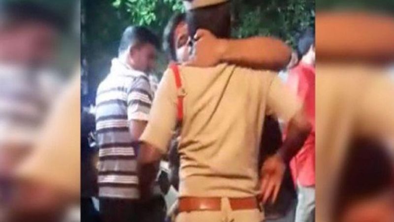Viral video of Telangana man kissing cop - viral video of telangana man ...