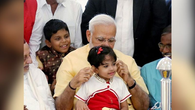Reason behind narendra modi pulling kids ear - Asianet News Hindi