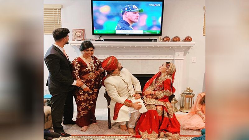 Pakistani couple watching cricket on wedding night, ICC shared photo ...