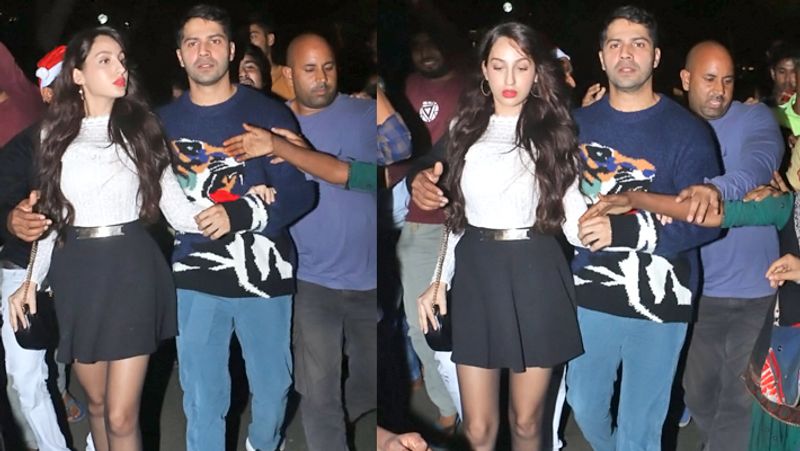 भीड़ के बीच बुरी तरह फंस गईं नोरा फतेही, वरुण धवन ने काफी जद्दोजहद के ...