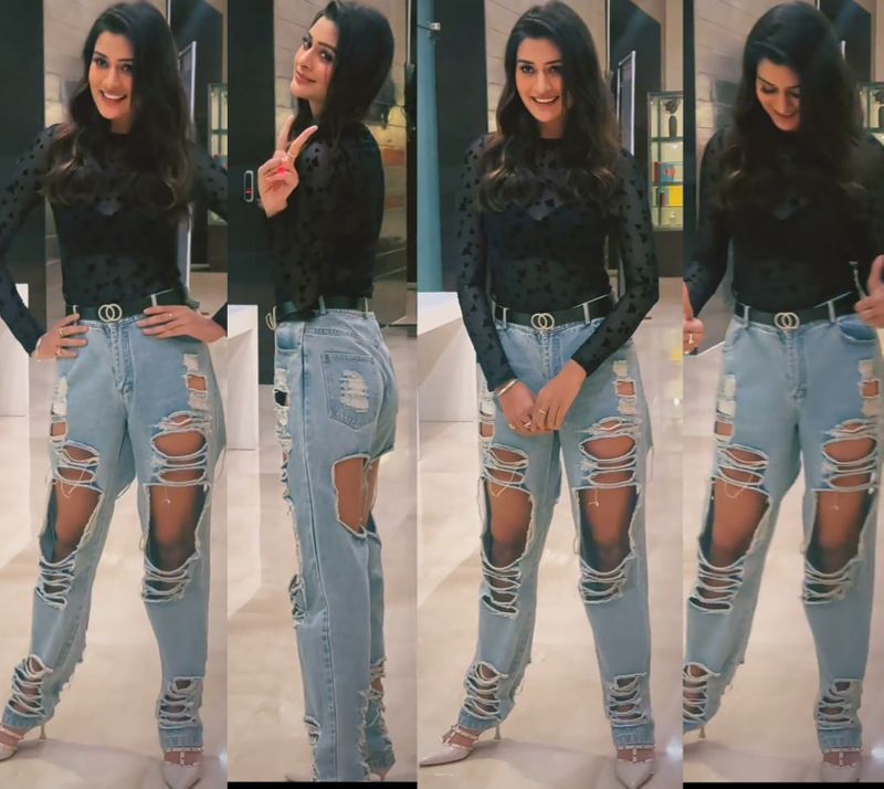 పూర్తిగా చిరిగిన ప్యాంటులో ఫ్రంట్ అండ్ బ్యాక్ చూపిస్తూ... ఆర్ఎక్స్ 100 ...