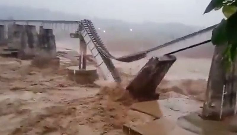 Railway bridge collapses due to heavy rainfall; spine-chilling video ...