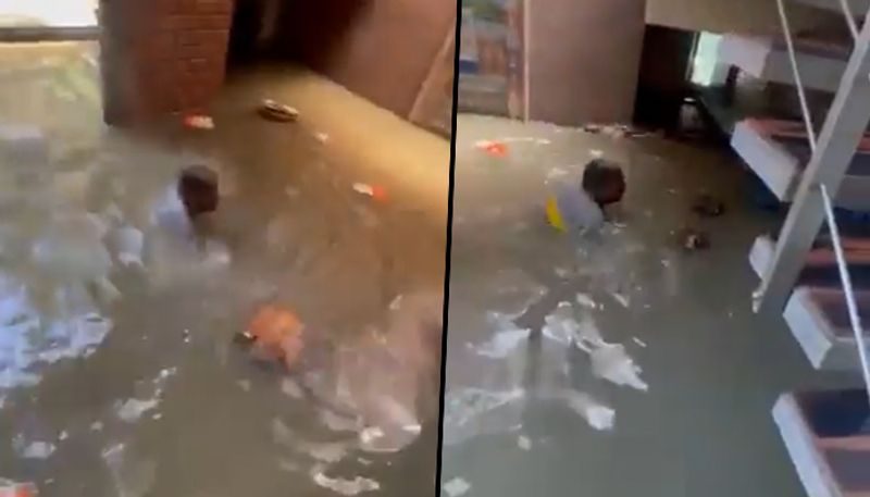 Watch viral video of man swimming in his living room amid Bengaluru ...