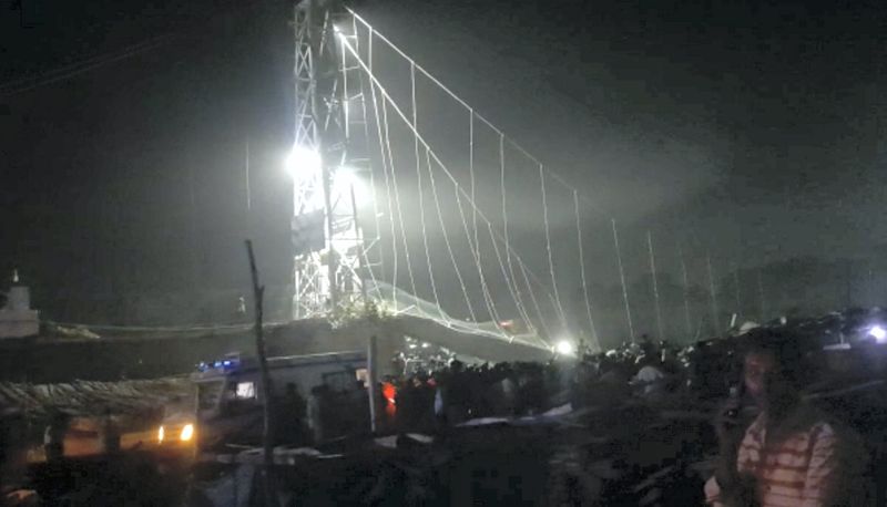 Gujarat: Over 60 dead as 100-year-old suspension bridge collapses in Morbi; rescue operation ...