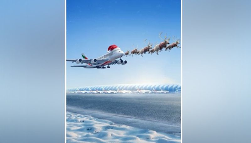 Emirates Christmas post showing Airbus 'wearing' Santa hat with ...